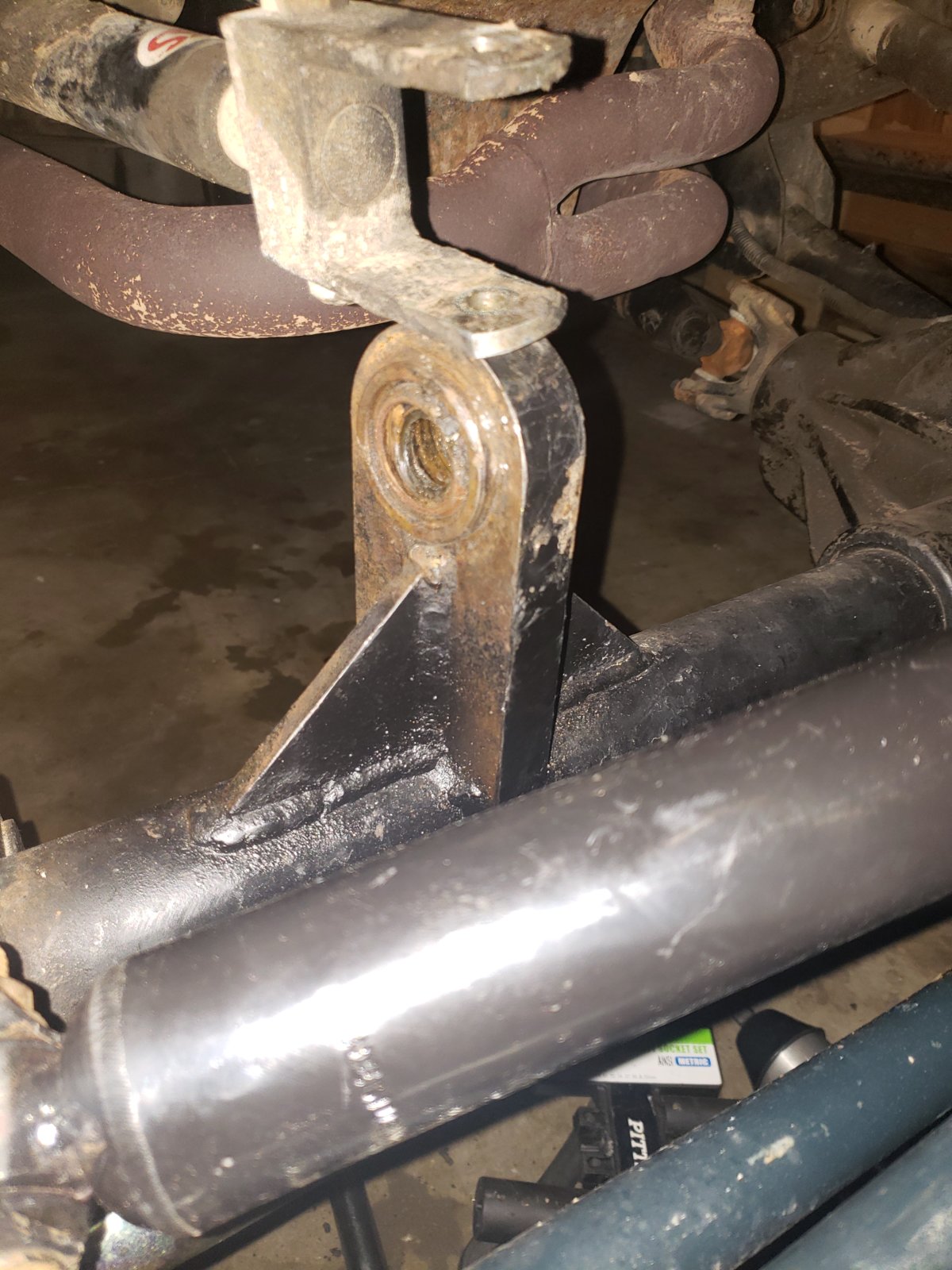 Is this axle-side control arm bushing welded on? | Jeep Wrangler TJ Forum