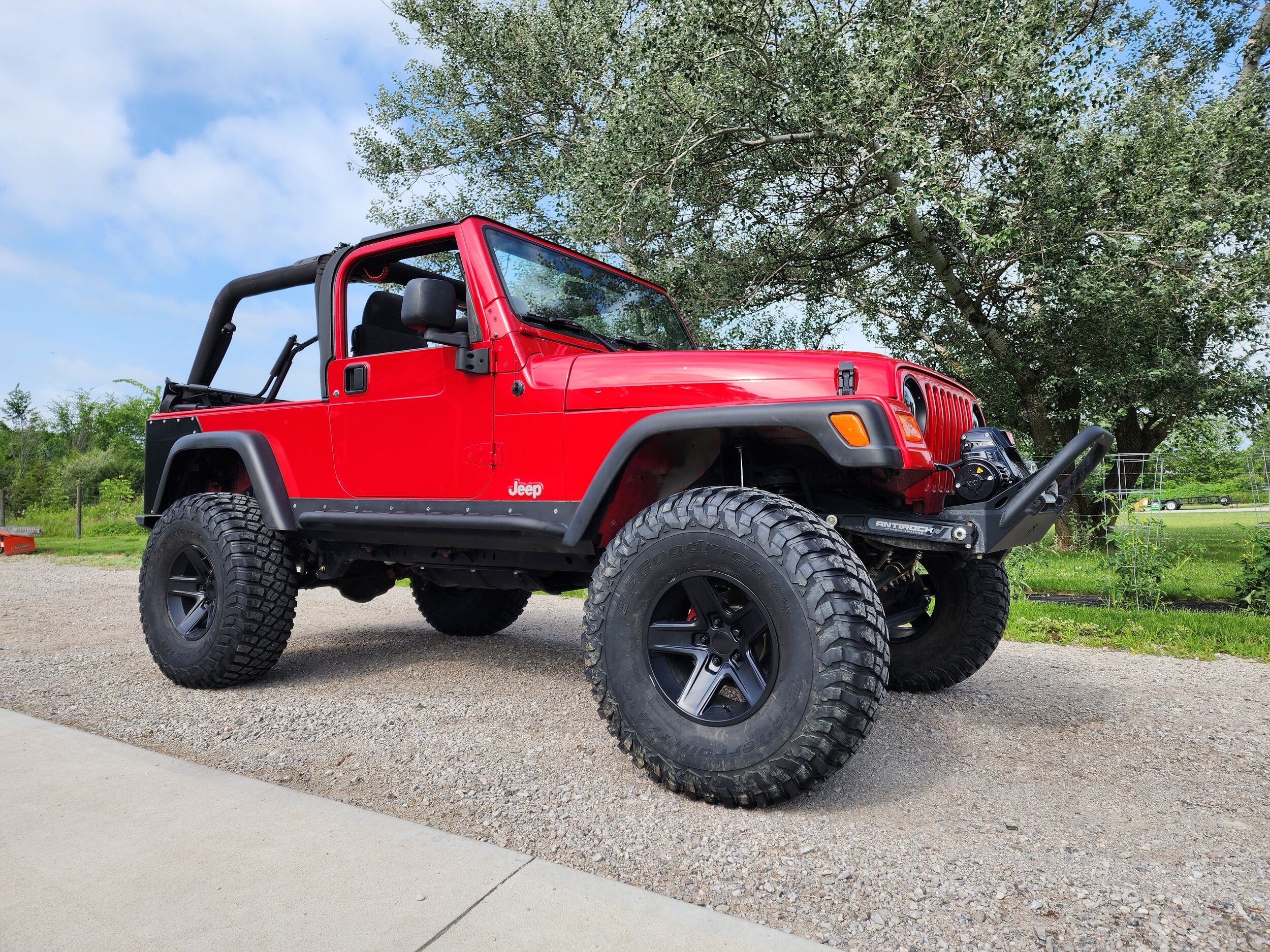 SOLD - 35x12.50R15 BF Goodrich KM3 tires on 5x4.5 black wheels | Jeep ...