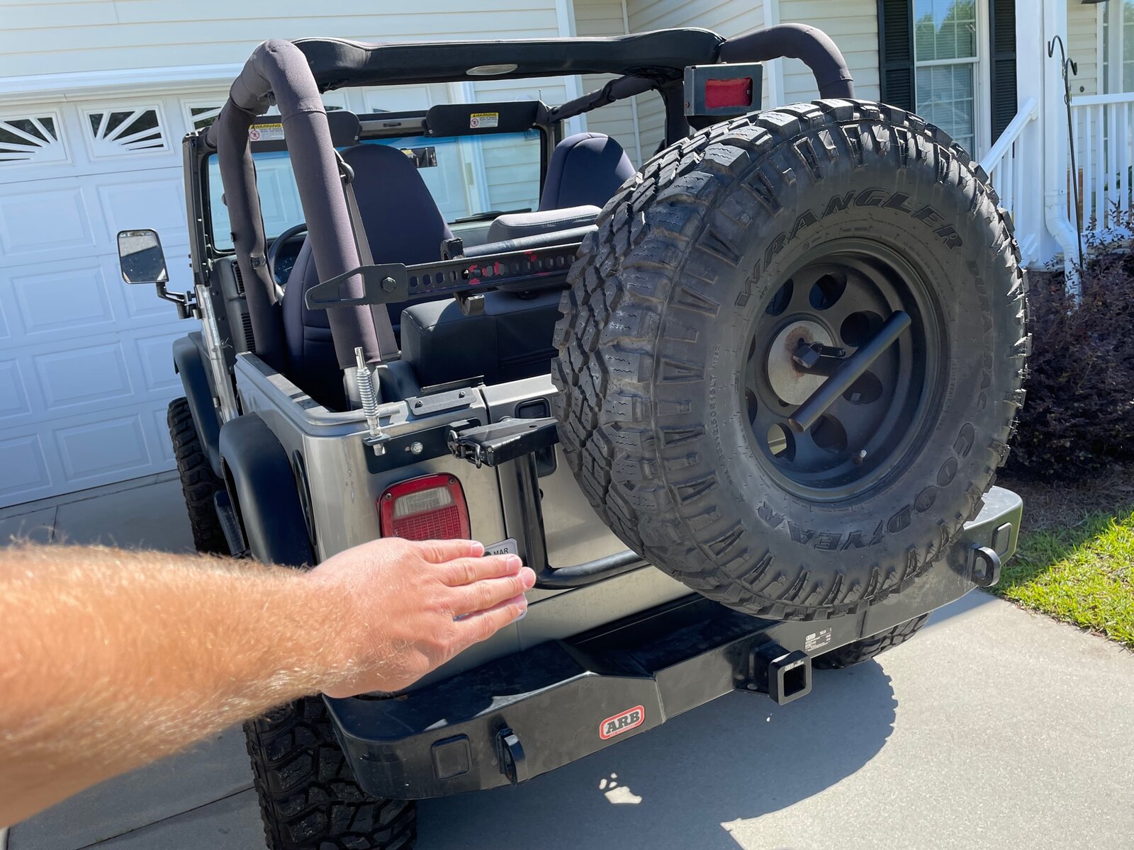 Help identify rear swing out tire carrier | Jeep Wrangler TJ Forum